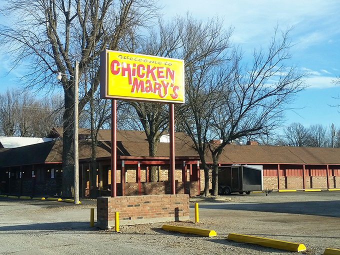 The iconic yellow sign of Chicken Mary's stands as a beacon of comfort food paradise in Pittsburg, Kansas, promising fried chicken worth the journey.