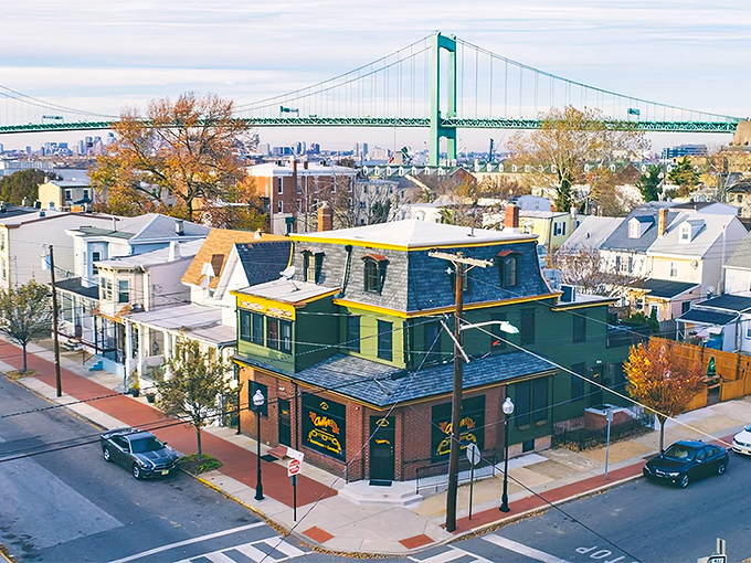 The Walt Whitman Bridge frames this charming corner of Irishtown, where historic architecture and modern affordability create a uniquely livable urban landscape.