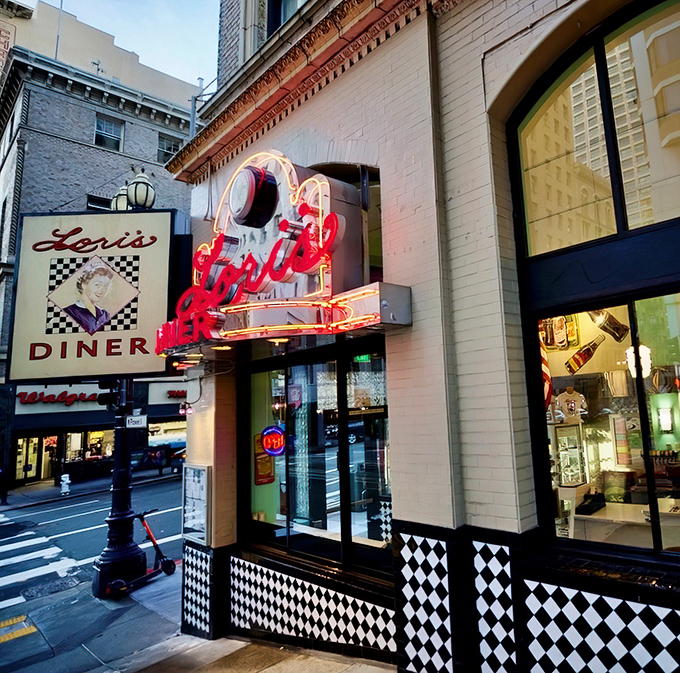 That neon glow isn't just lighting up Mason Street&mdash;it's a beacon calling all hungry time travelers to Lori's Diner, where nostalgia comes with a side of fries.