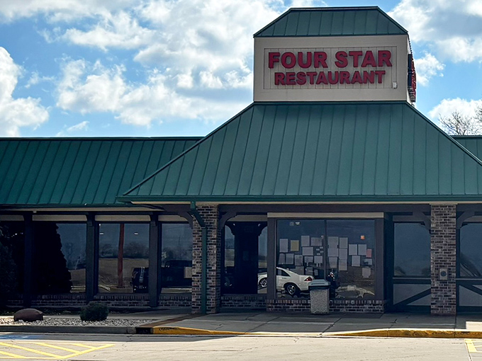 The green-roofed beacon of comfort food stands proudly along Route 251, promising the kind of meal that makes detours worthwhile.