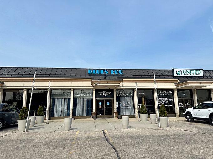 The welcoming exterior of Blue's Egg invites you in with its distinctive blue signage and clean, modern façade – breakfast nirvana awaits behind those doors.