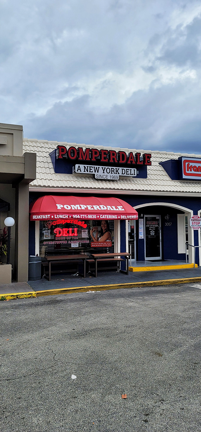 That bold blue and red exterior isn't trying to be subtle, and neither are the sandwiches waiting inside.