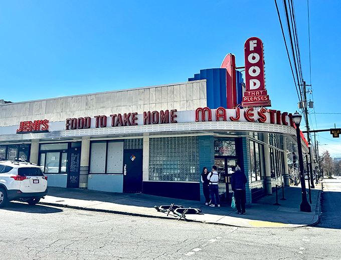 The iconic Majestic Diner facade stands proudly on Ponce de Leon Avenue, its vintage "FOOD" sign a beacon to hungry Atlantans since long before neon was considered retro.