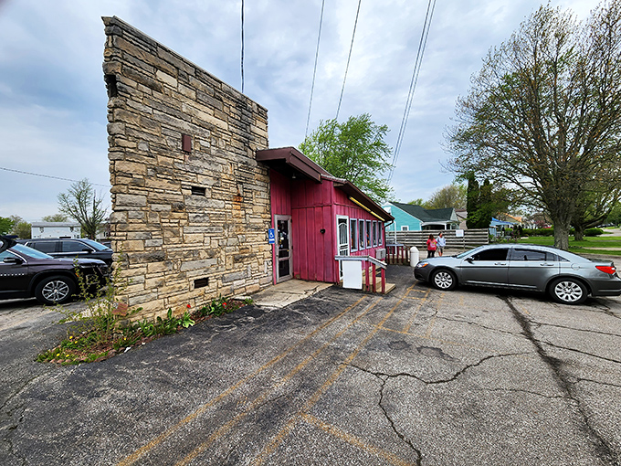 The stone facade and pink exterior of Porky's Drive-In stands as a delicious time capsule in Mansfield.