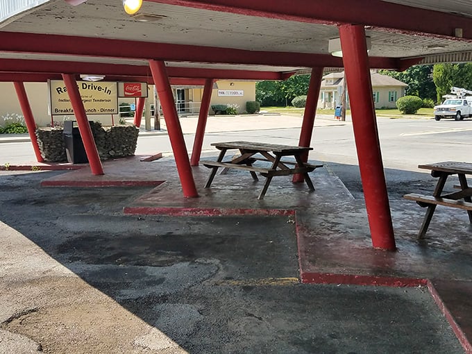 The iconic red-pillared entrance to Ray's Drive-In stands as a beacon of comfort food in Kokomo, promising nostalgic flavors that never go out of style.