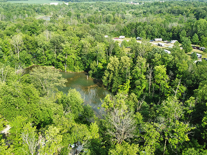 A bird's-eye view reveals Summit Lake's true character &ndash; a blue oasis cradled by an emerald forest, where civilization politely keeps its distance.