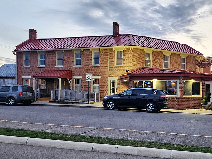 The brick exterior of Old Canal Smoke House stands like a culinary fortress in Chillicothe, promising smoky treasures within its red-roofed walls.