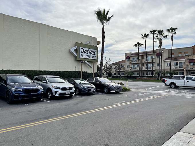 Parking lot simplicity belies the culinary treasures within. This unassuming exterior is like finding your grandmother's secret jewelry box in the attic.