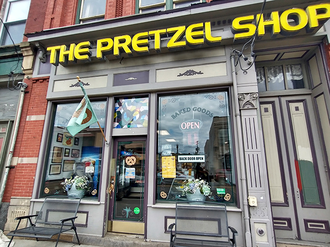 The iconic yellow signage of The Pretzel Shop beckons carb-lovers on Pittsburgh's East Carson Street like a doughy lighthouse in a sea of hunger.