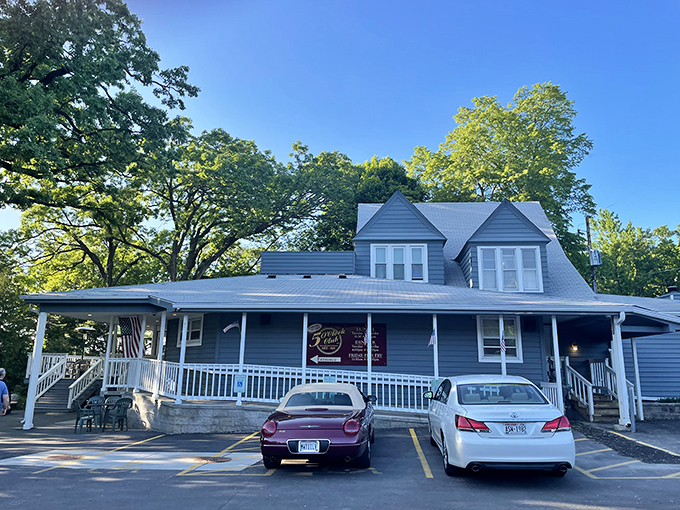 The blue cottage-like exterior of The 5 O'Clock Club welcomes you like an old friend, promising comfort and deliciousness behind its unassuming façade.