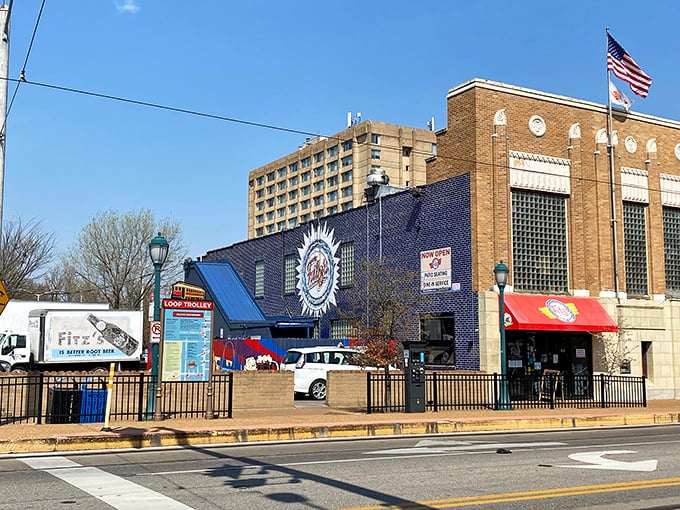 The iconic blue facade of Fitz's stands proudly on Delmar Boulevard, like a fizzy beacon calling hungry travelers home.