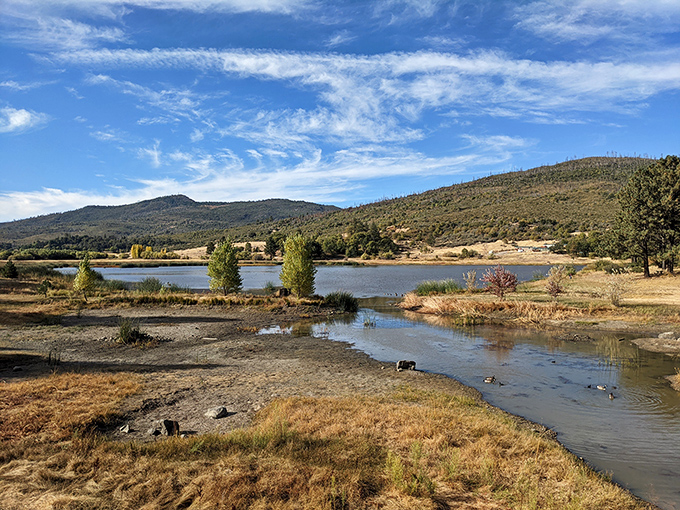 Lake Cuyamaca shimmers like nature's mirror, reflecting mountains and clouds in a display that puts Instagram filters to shame.