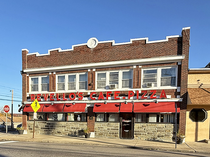 The classic brick fa&ccedil;ade with those iconic red awnings stands like a beacon of comfort food on Old Forge's Main Street&mdash;a timeless invitation to pizza paradise.