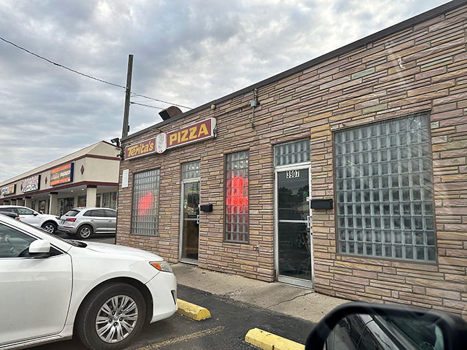 The unassuming stone facade of Terita's Pizza stands as a culinary time capsule on Cleveland Avenue, promising delicious treasures within.