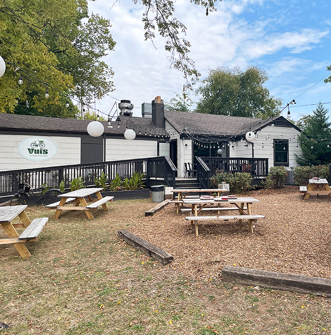 A charming cottage transformed into Vietnamese food heaven, complete with picnic tables where strangers become friends over steaming bowls of pho.