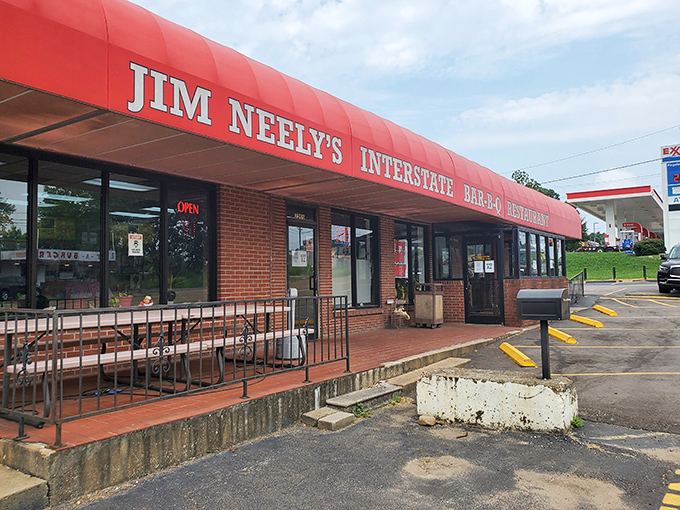 The iconic red awning of Jim Neely's Interstate Bar-B-Q stands as a beacon of smoky promise to barbecue pilgrims in Memphis.
