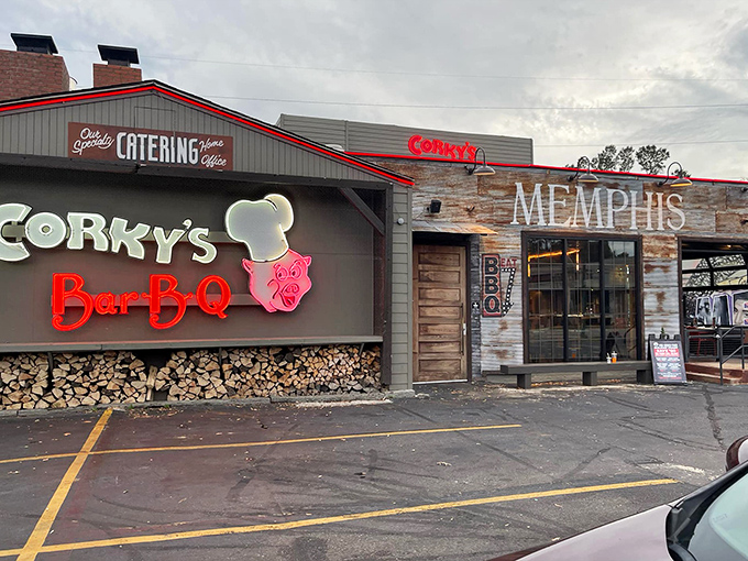 The barbecue beacon of Memphis stands proud with its iconic pig chef logo and stacked woodpile&mdash;a smoky promise of deliciousness awaits inside.