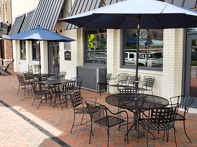 Downtown Alpharetta's worst-kept secret beckons with its inviting patio. Those umbrellas aren't just for show&mdash;they're sheltering future food comas in the making.