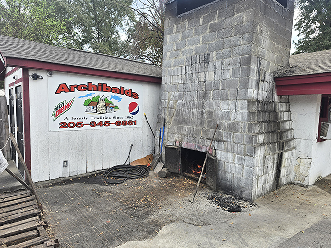 The cinderblock fortress of flavor known as Archibald&rsquo;s BBQ. That chimney isn&rsquo;t for show&mdash;it&rsquo;s been sending up smoke signals to hungry Alabamians for generations.