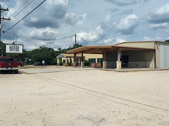 Like a mirage in the Texas countryside, Baker Boys BBQ's unassuming exterior belies the flavor explosion waiting inside. The gravel parking lot has witnessed many happy arrivals.