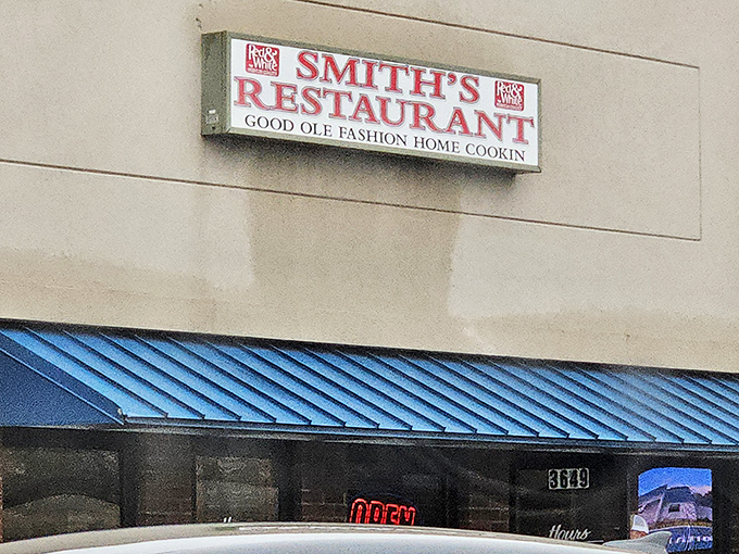 That iconic blue awning signals you've arrived at the promised land of country cooking, where biscuit dreams come true.