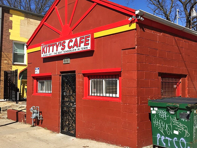 The fire-engine red exterior of Kitty's Cafe stands like a culinary lighthouse in Kansas City, promising sandwich salvation to all who enter.