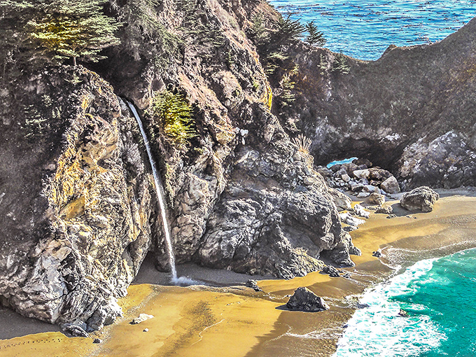 Nature's perfect postcard moment: McWay Falls cascades 80 feet onto a pristine beach, creating what might be California's most photogenic spot.
