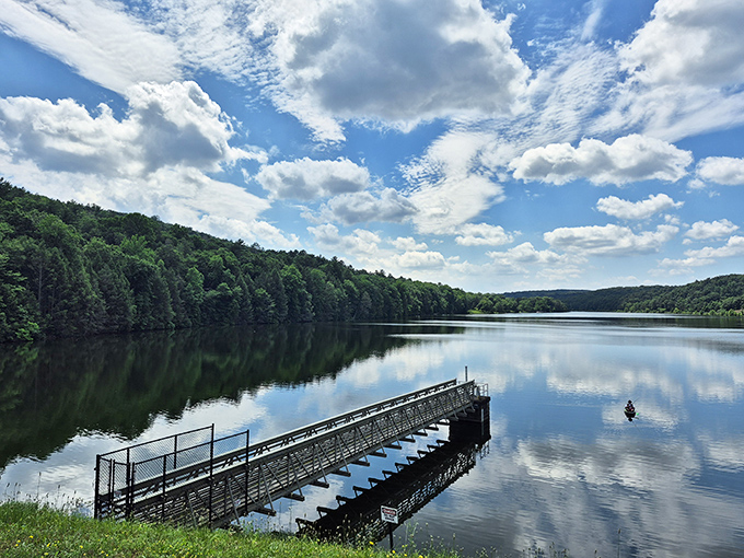 This mirror-like lake reflects clouds so perfectly, you'll wonder which way is up &ndash; nature's own optical illusion.