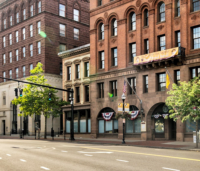 Downtown New Britain's historic brick buildings stand like sentinels of the city's industrial past, now guardians of its affordable future.
