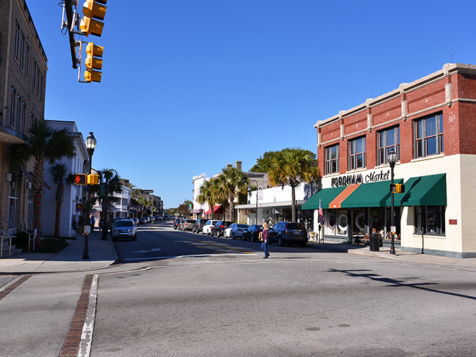 Bay Street beckons with its perfect blend of Southern charm and coastal cool. Palm trees stand sentinel over storefronts that haven't forgotten their history.
