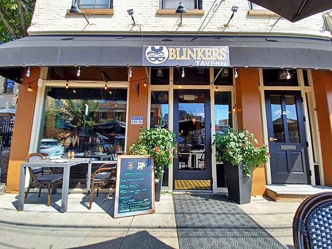 Blinkers Tavern welcomes you with understated charm, its warm exterior and inviting patio seating promising culinary treasures that outshine its modest fa&ccedil;ade.
