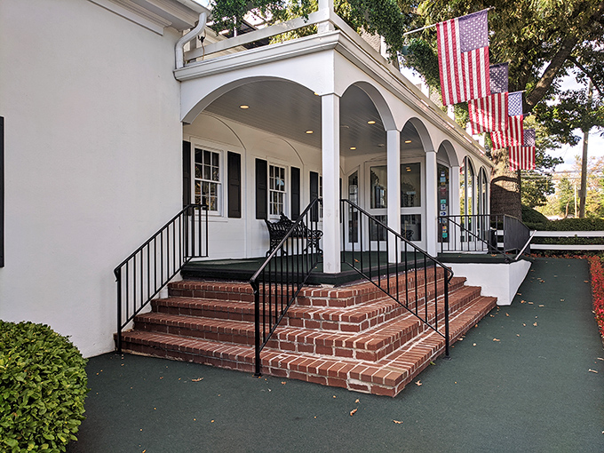 The stately white colonial facade of William Penn Inn welcomes guests with classic columns and brick steps&mdash;architectural elegance that whispers of Pennsylvania's storied past.