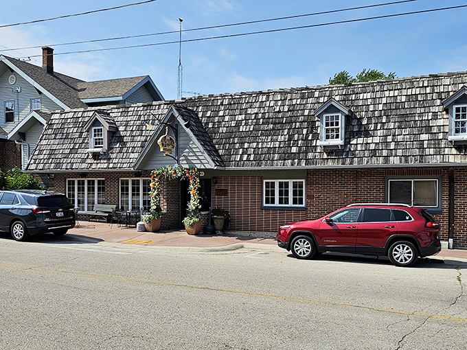 The architectural equivalent of a warm hug, complete with dormers that could tell stories from decades past.