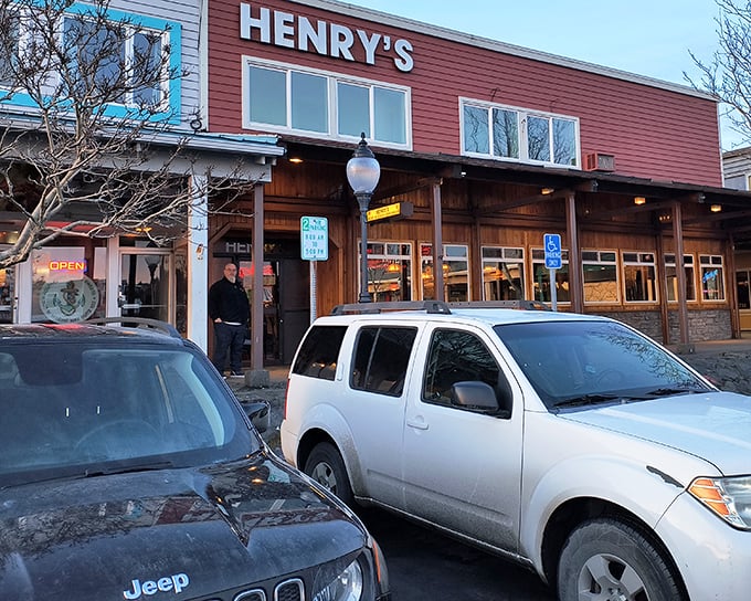 Henry's bold red exterior stands like a beacon of culinary promise in Kodiak, where locals know the best meals often hide behind the most unassuming facades.