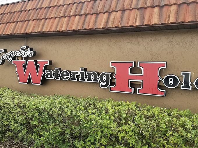 The unassuming exterior of Cowpoke's Watering Hole proves the old adage: the less flashy the sign, the better the food inside.