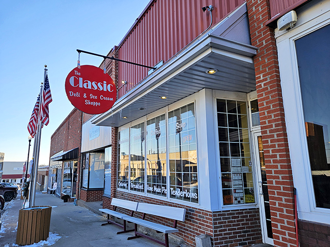 The iconic red sign of The Classic Deli & Ice Cream Shoppe beckons like a culinary lighthouse on Brooklyn's main street, promising comfort and satisfaction just steps away.