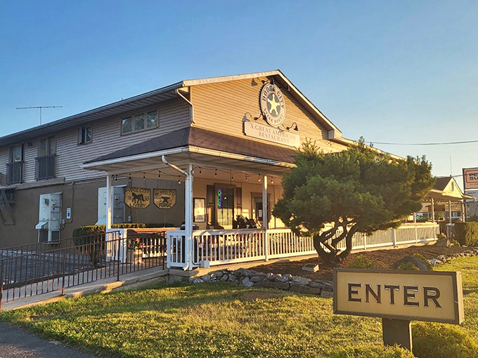 The Western-themed exterior beckons like an oasis for hungry travelers. That "ENTER" sign might as well say "Abandon all diets, ye who enter here."