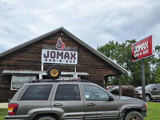Weathered wooden walls that have absorbed decades of hickory smoke. This isn't designer rustic; it's the real deal earned through years of pit mastery.