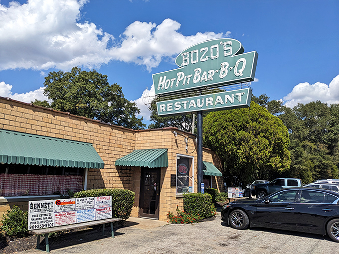 That vintage teal sign against the Tennessee sky isn't just advertising&mdash;it's a beacon of barbecue hope for hungry travelers on Highway 70.