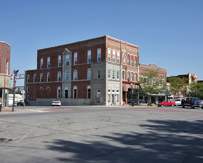 Historic brick buildings frame Centerville's town square, where your retirement dollars stretch like yoga instructors and charm comes standard with every hello.