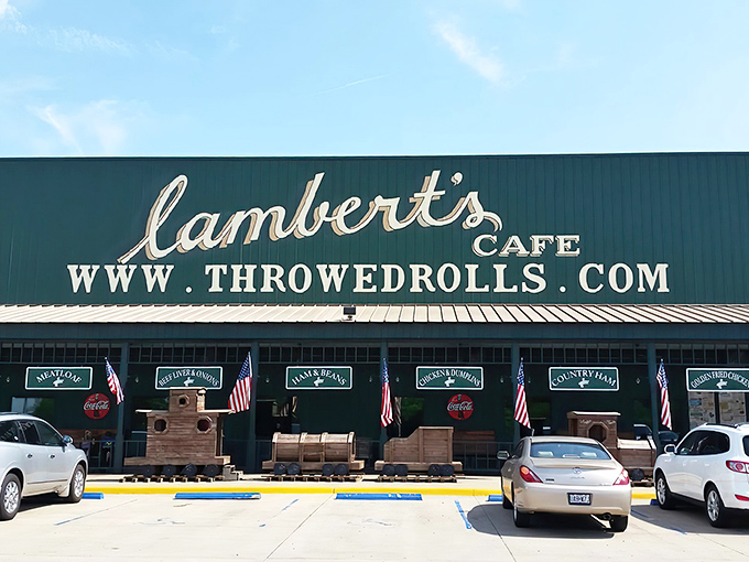The green exterior of Lambert's proudly announces its identity as the "Home of Throwed Rolls" &ndash; a promise of both sustenance and entertainment.