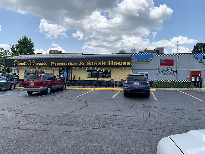 The yellow exterior with its bold black awning stands like a beacon of breakfast hope on Indianapolis's northeast side. Charlie Browns promises comfort before you even walk through the door.