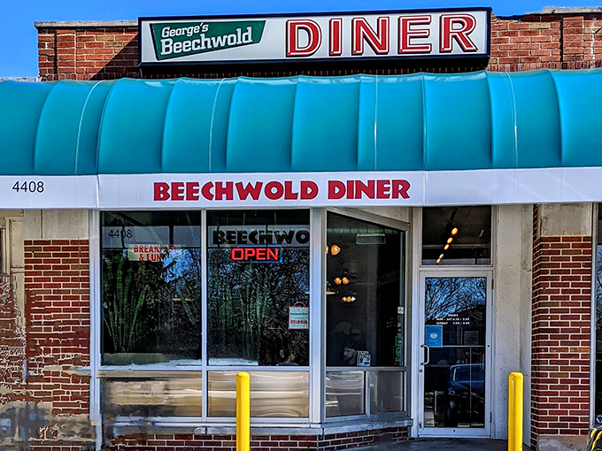 The turquoise awning of George's Beechwold Diner beckons like a beacon of breakfast hope in Columbus. No fancy frills, just the promise of honest-to-goodness diner delights.