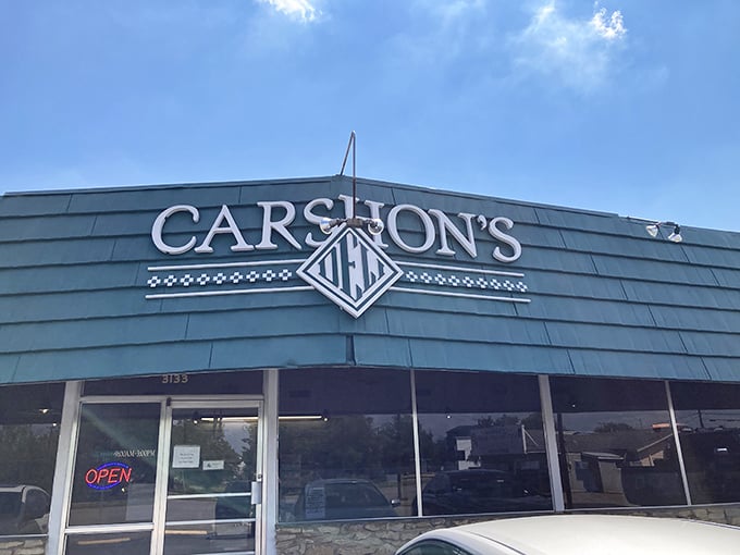 Carshon's distinctive diamond logo welcomes hungry visitors with the promise of authentic deli delights. Even the "OPEN" sign seems to wink with anticipation.