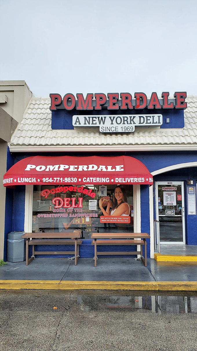 That bold blue and red exterior isn't trying to be subtle, and neither are the sandwiches waiting inside.