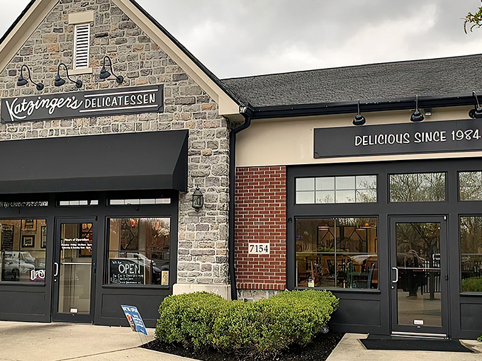 The stone facade of Katzinger's Dublin promises delicatessen delights within—like finding a New York treasure hiding in plain sight in Ohio.
