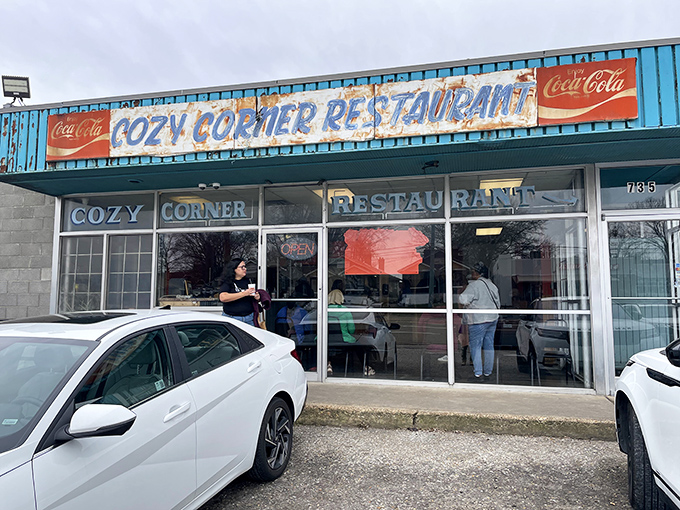 The unassuming storefront of Cozy Corner Restaurant stands as Memphis' barbecue beacon, promising smoky treasures within those humble walls.