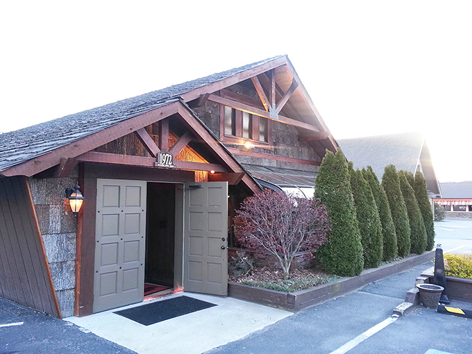 Step inside this rustic mountain lodge where exposed beams and stone walls whisper "serious steaks ahead."