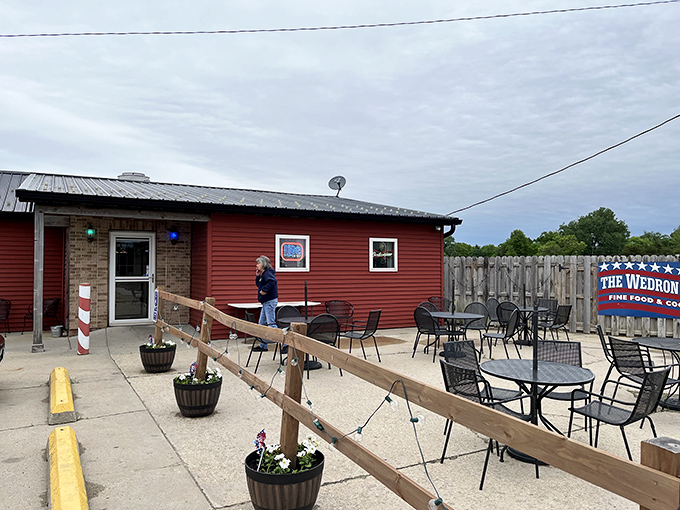 The unassuming red exterior of Wedron Office hides culinary treasures within. Like finding a Picasso at a yard sale, this place delivers unexpected delights.
