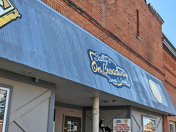 Sally's iconic blue awning welcomes visitors with a promise of good food and even better company in this cherished Iowa establishment.